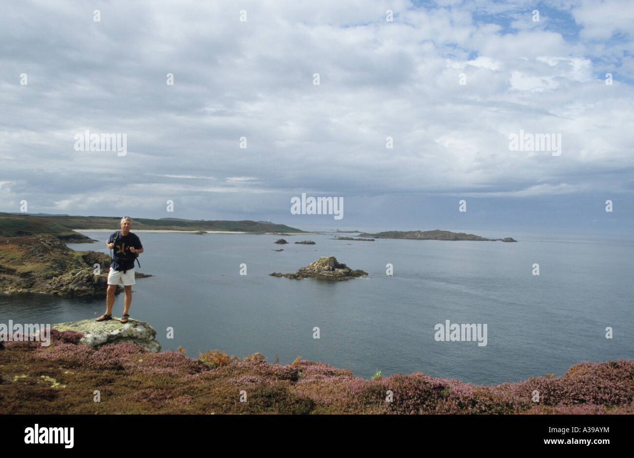 Walker on the cliffs of St Martin s island Scilly Islands Cornwall ...