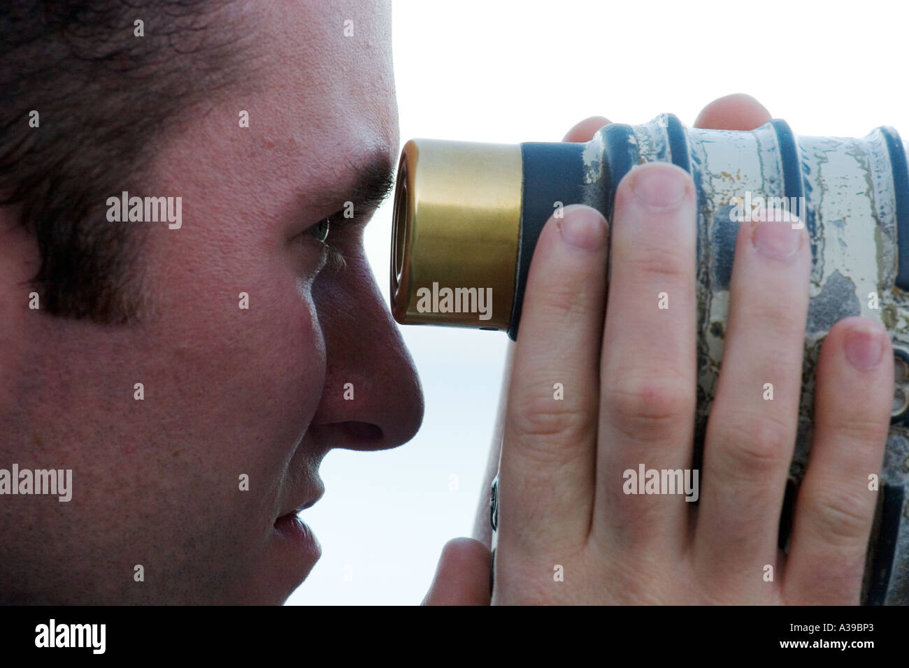 Man looking through spyglass hi-res stock photography and images - Alamy