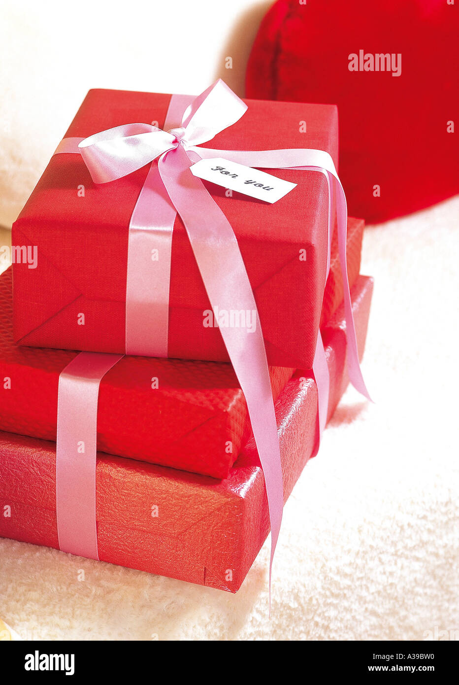 red gift boxes with pink ribbon Stock Photo - Alamy