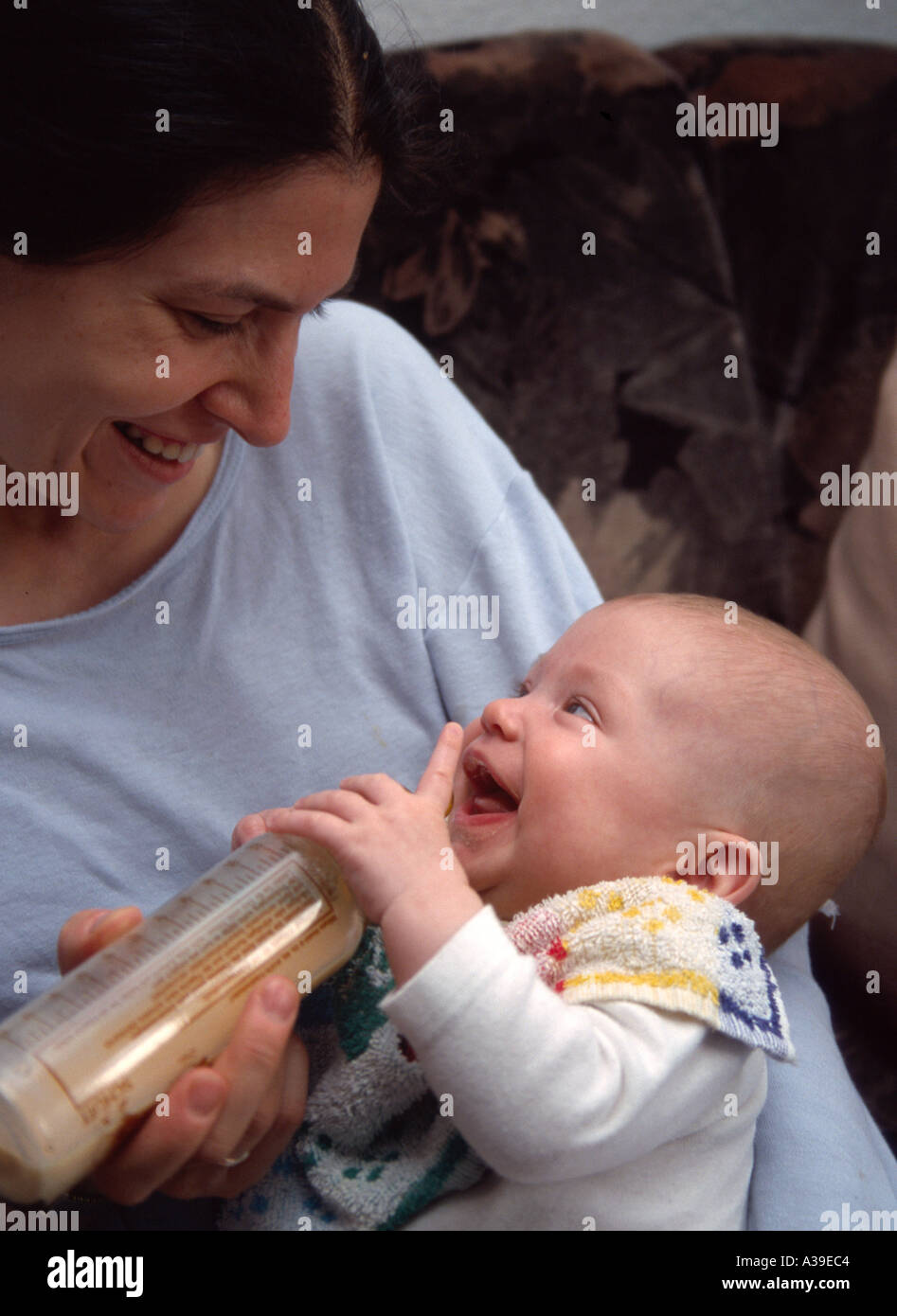 Fondling the baby Stock Photo - Alamy