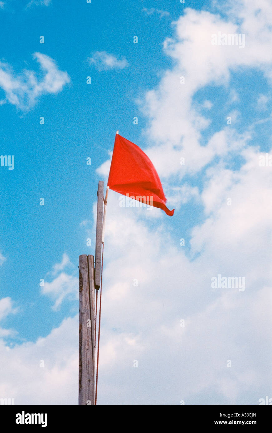 flag red sky wind Stock Photo - Alamy