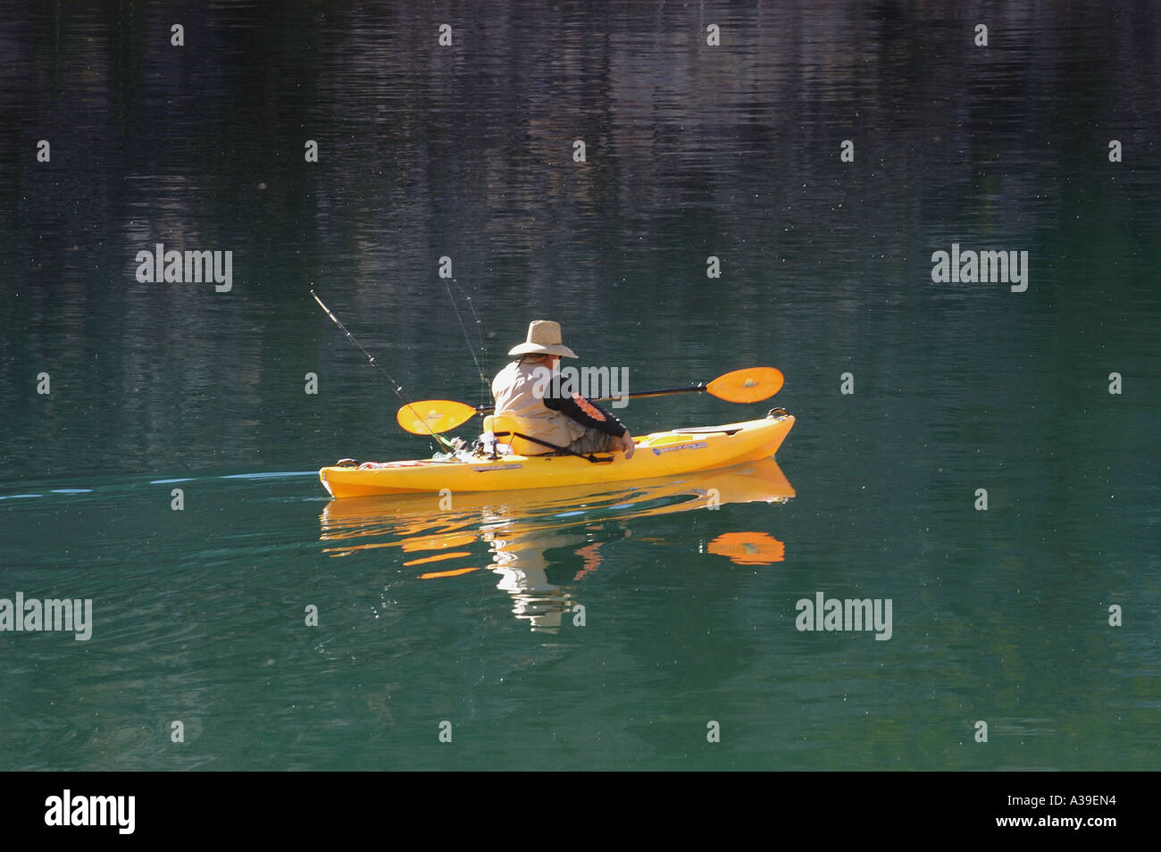 man fishing in lake Stock Photo - Alamy
