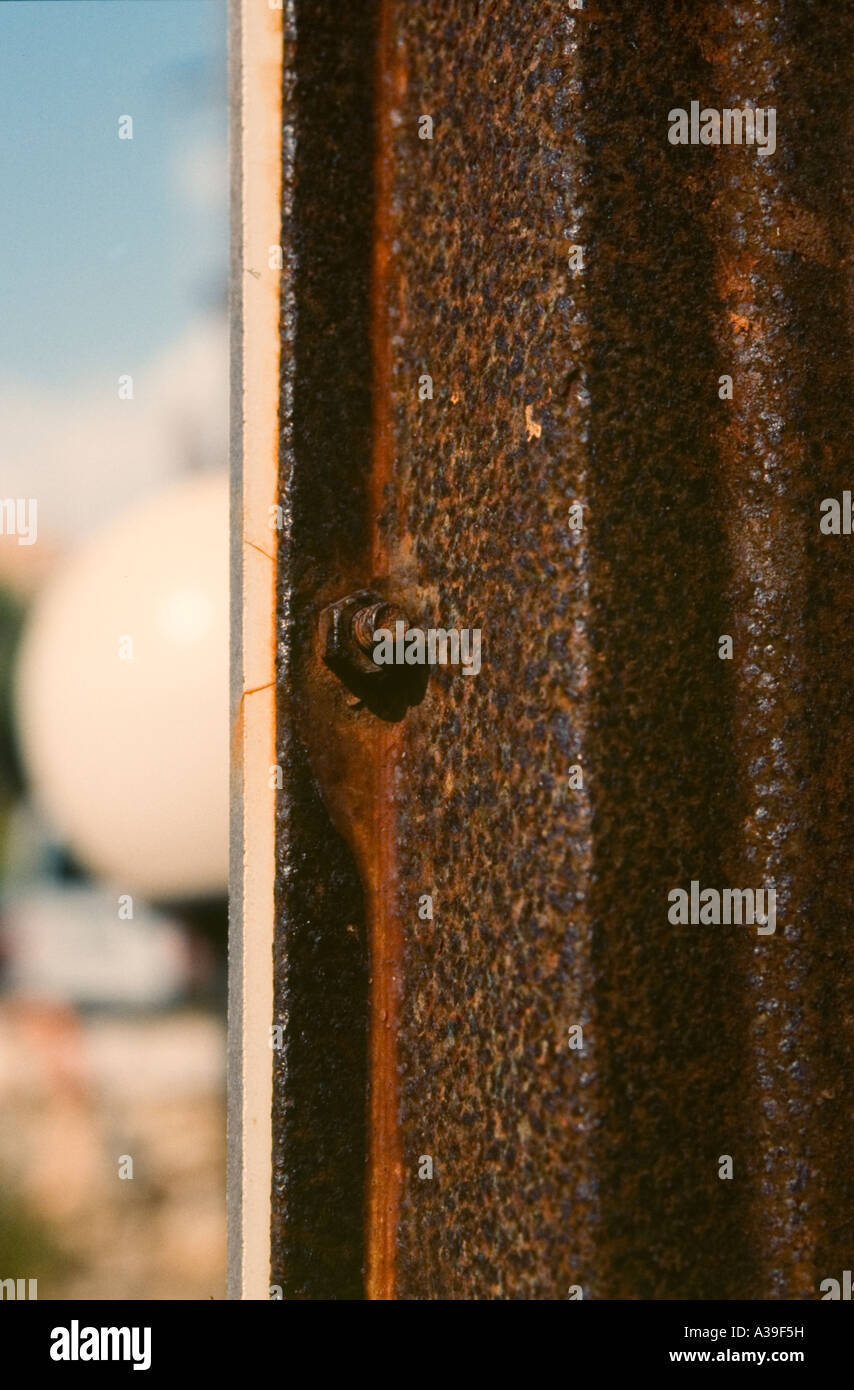 iron door rust plate bolt bolthead screw allen setting Stock Photo - Alamy