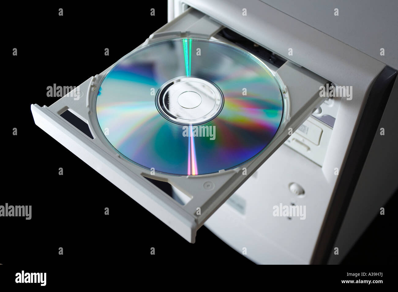 A Cd in a drive tray Stock Photo - Alamy