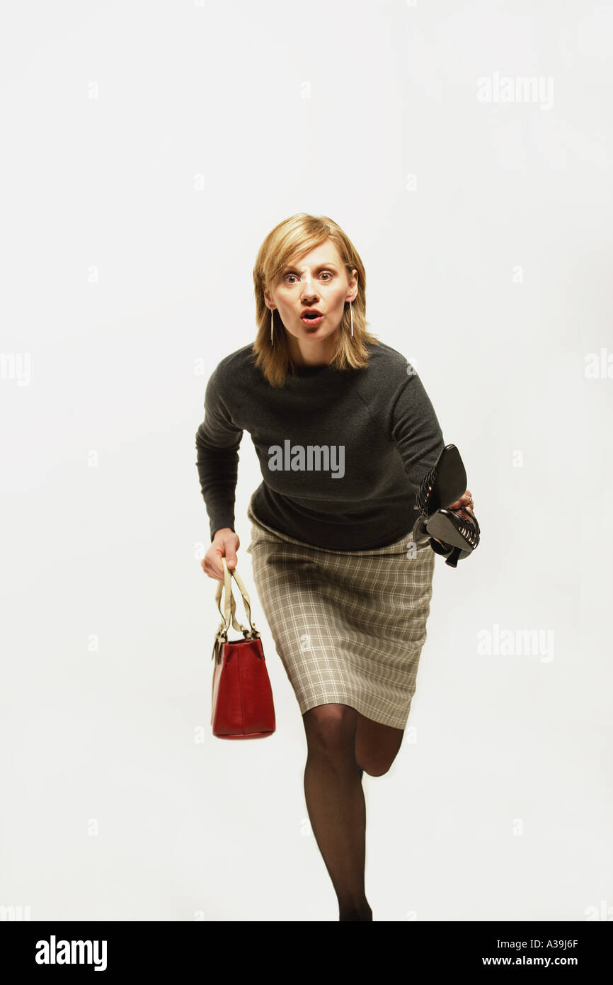 Blonde woman running barefoot hi-res stock photography and images - Alamy