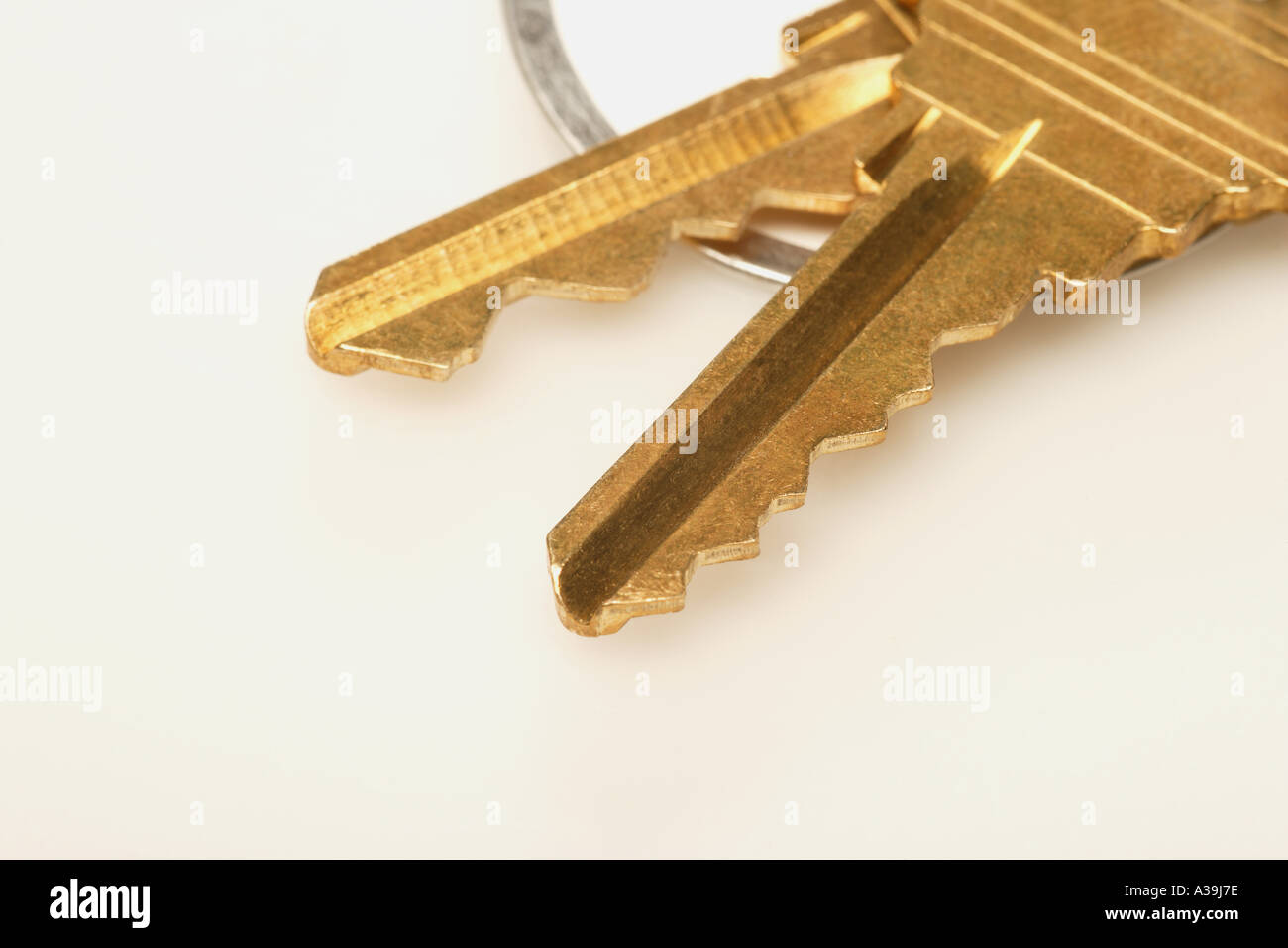Two golden keys hi-res stock photography and images - Alamy