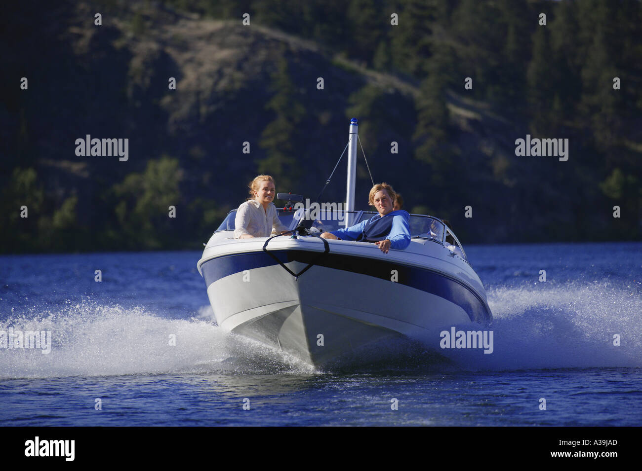 Speed boat on water Stock Photo - Alamy