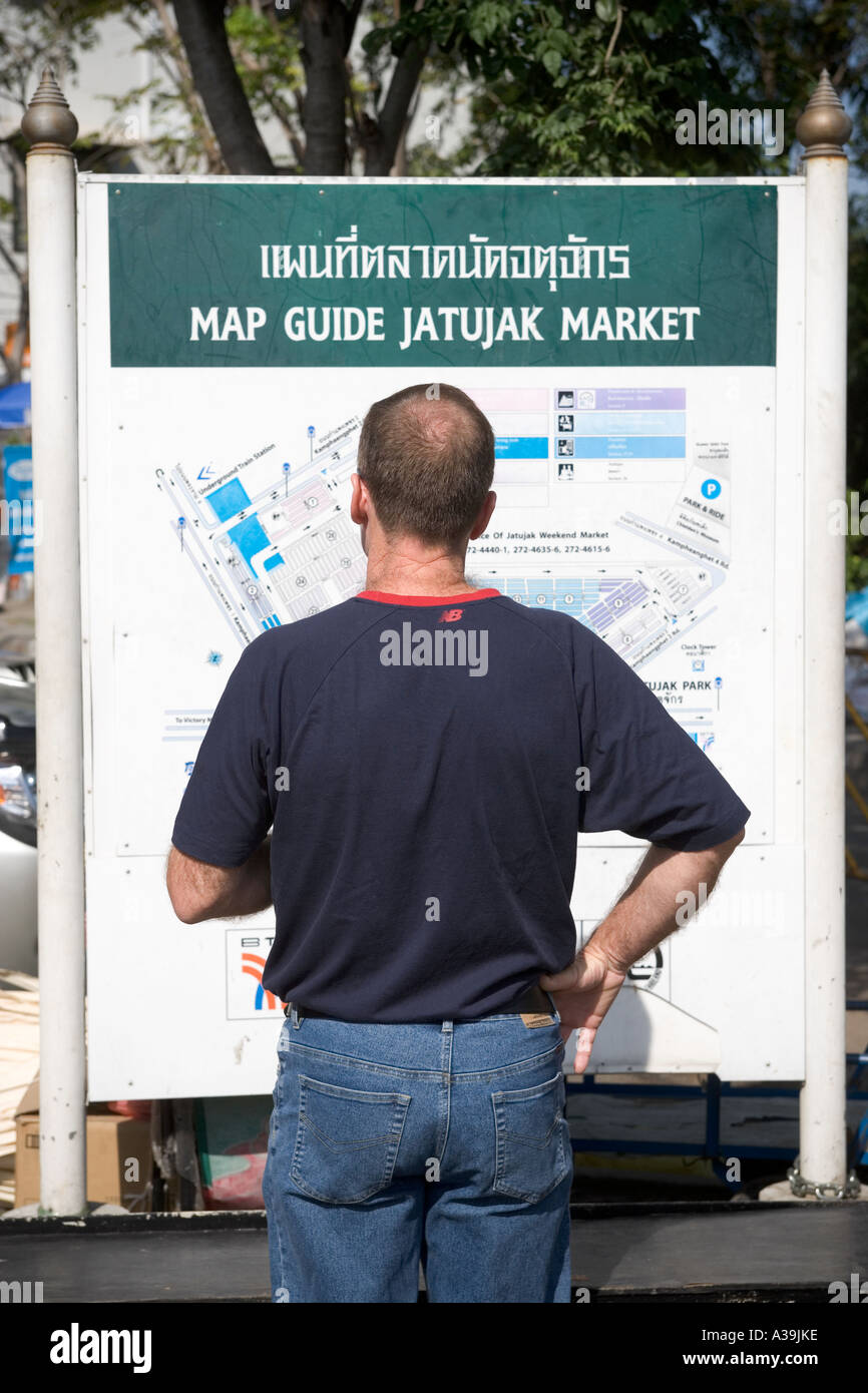 Tourist Reading Guide Map Sign at Chatuchak Market Bangkok Stock Photo ...