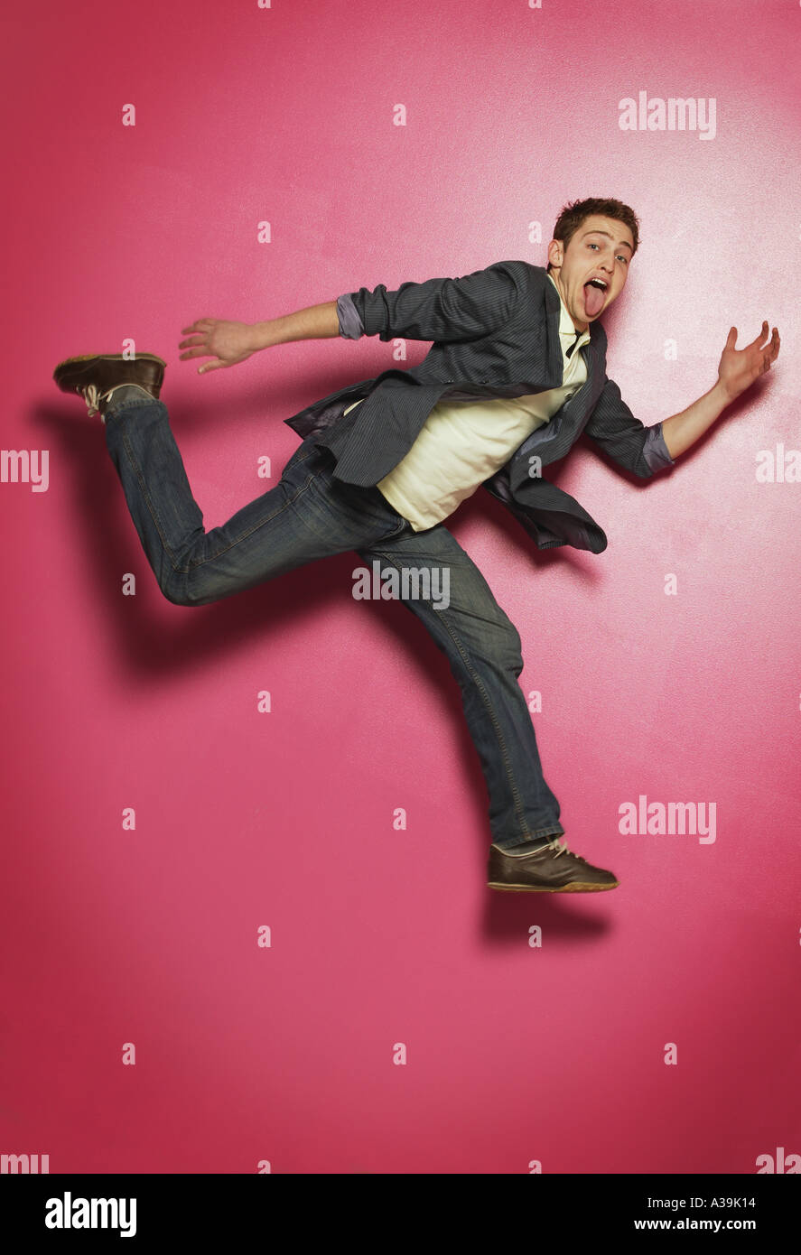 Man making funny face Stock Photo - Alamy