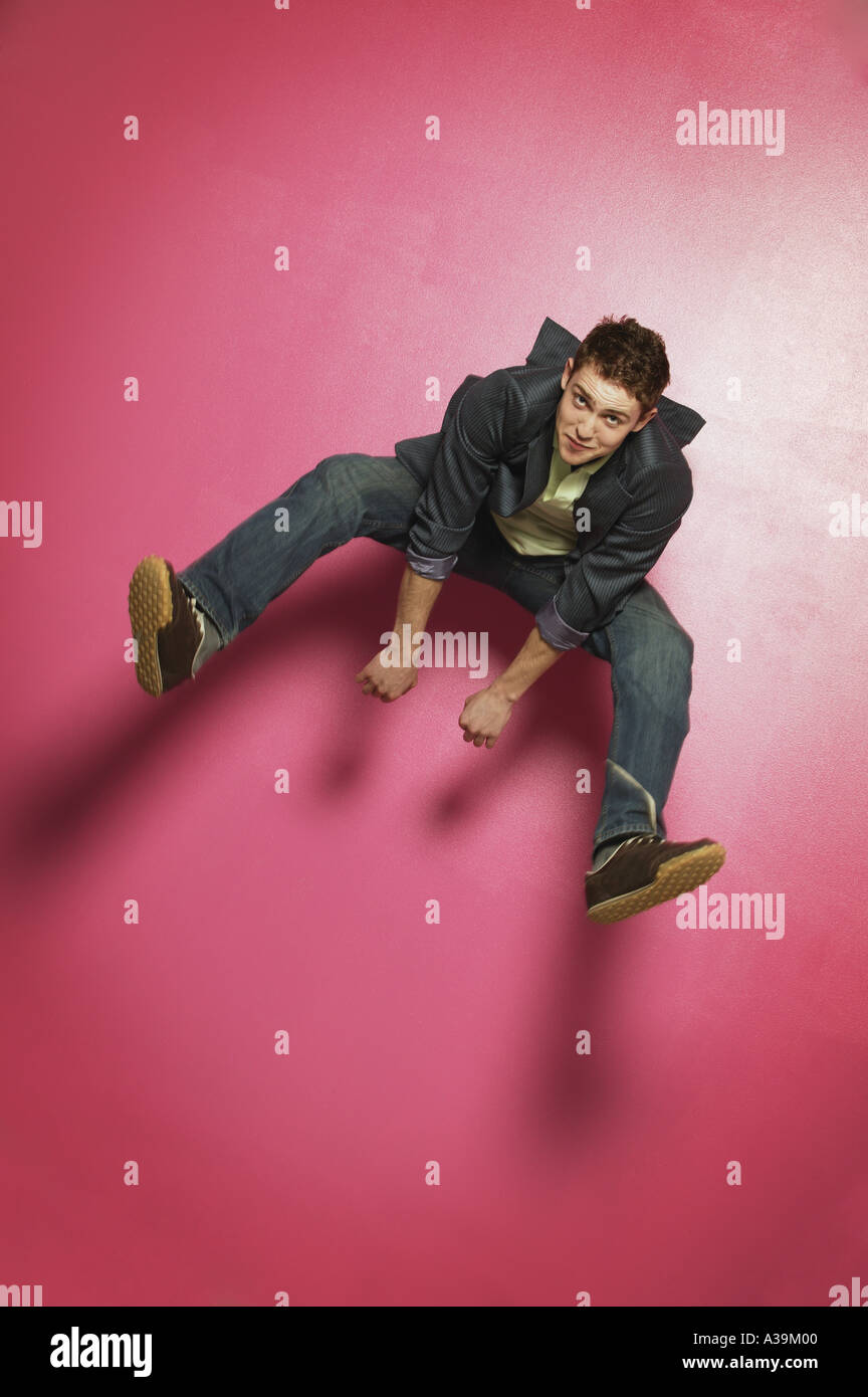 Portrait of teenager jumping Stock Photo - Alamy