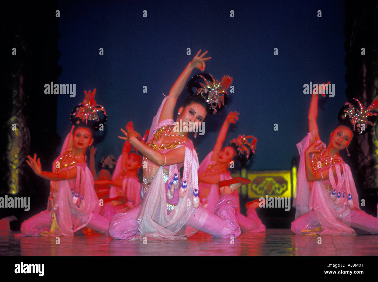 Chinese dancers on stage in hi-res stock photography and images - Alamy