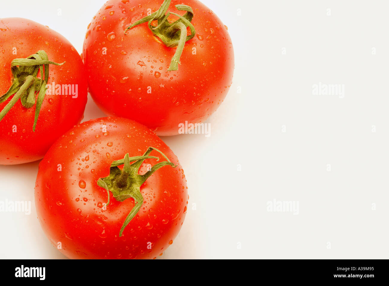 Three ripe tomatoes Stock Photo - Alamy