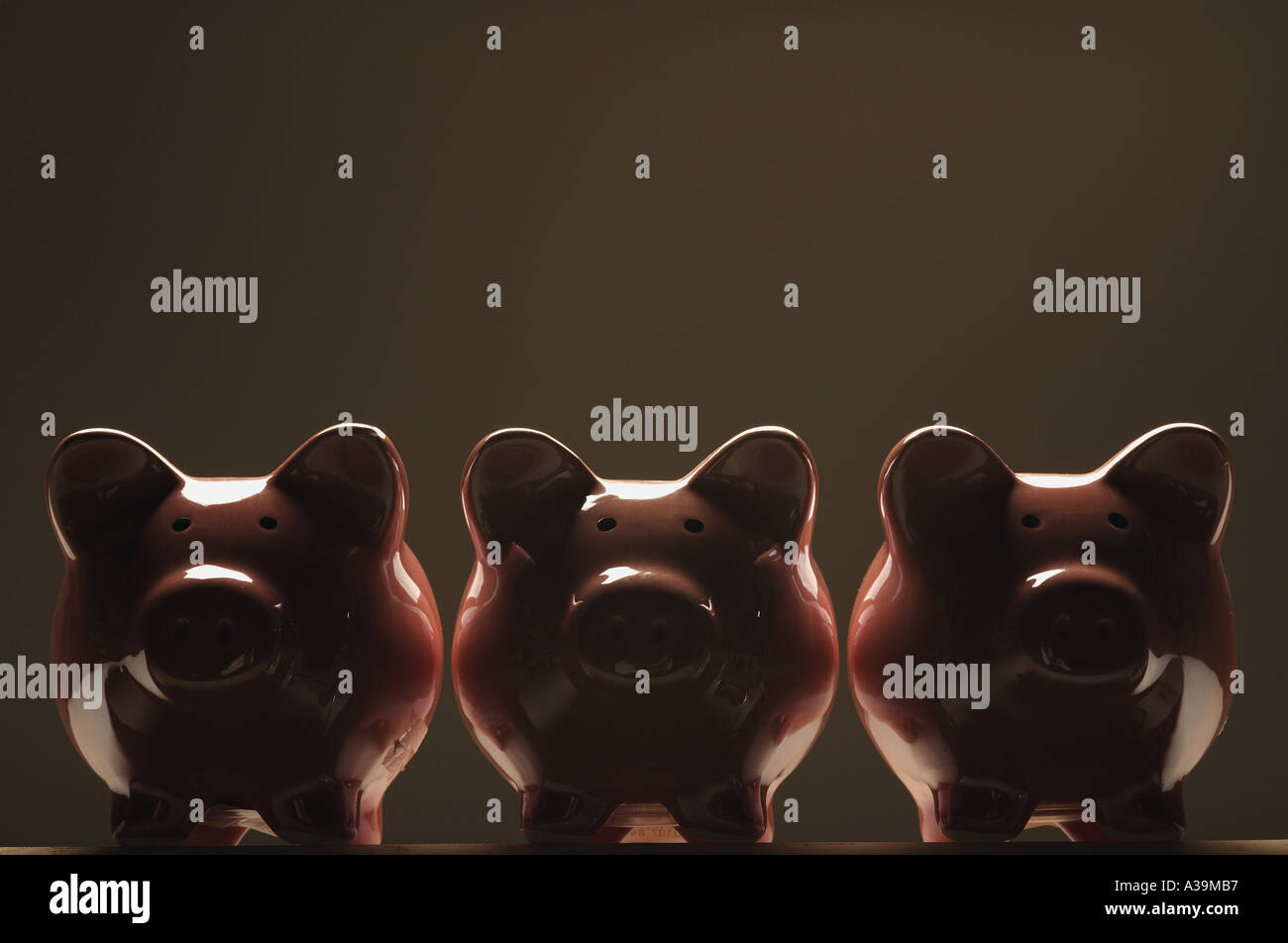 Three pottery pigs Stock Photo - Alamy