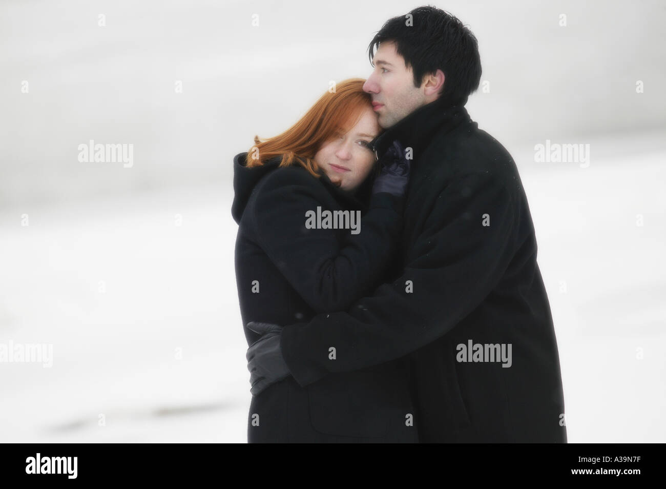 Couple holding each other Stock Photo - Alamy