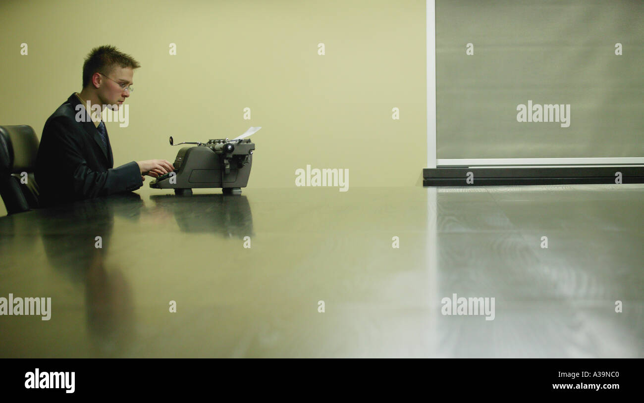 Man working at typewriter hi-res stock photography and images - Alamy