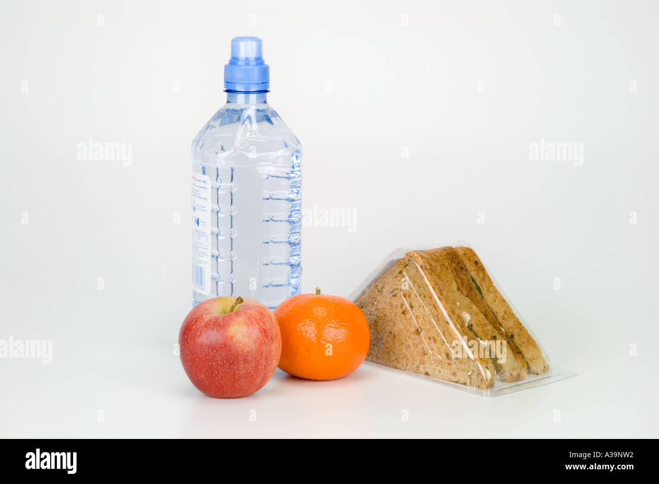 simple packed snack lunch water fruit sandwich Stock Photo - Alamy