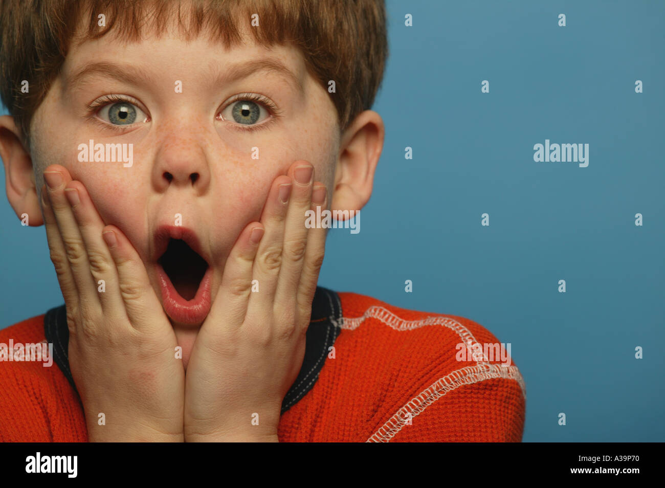 Child with surprised expression Stock Photo - Alamy