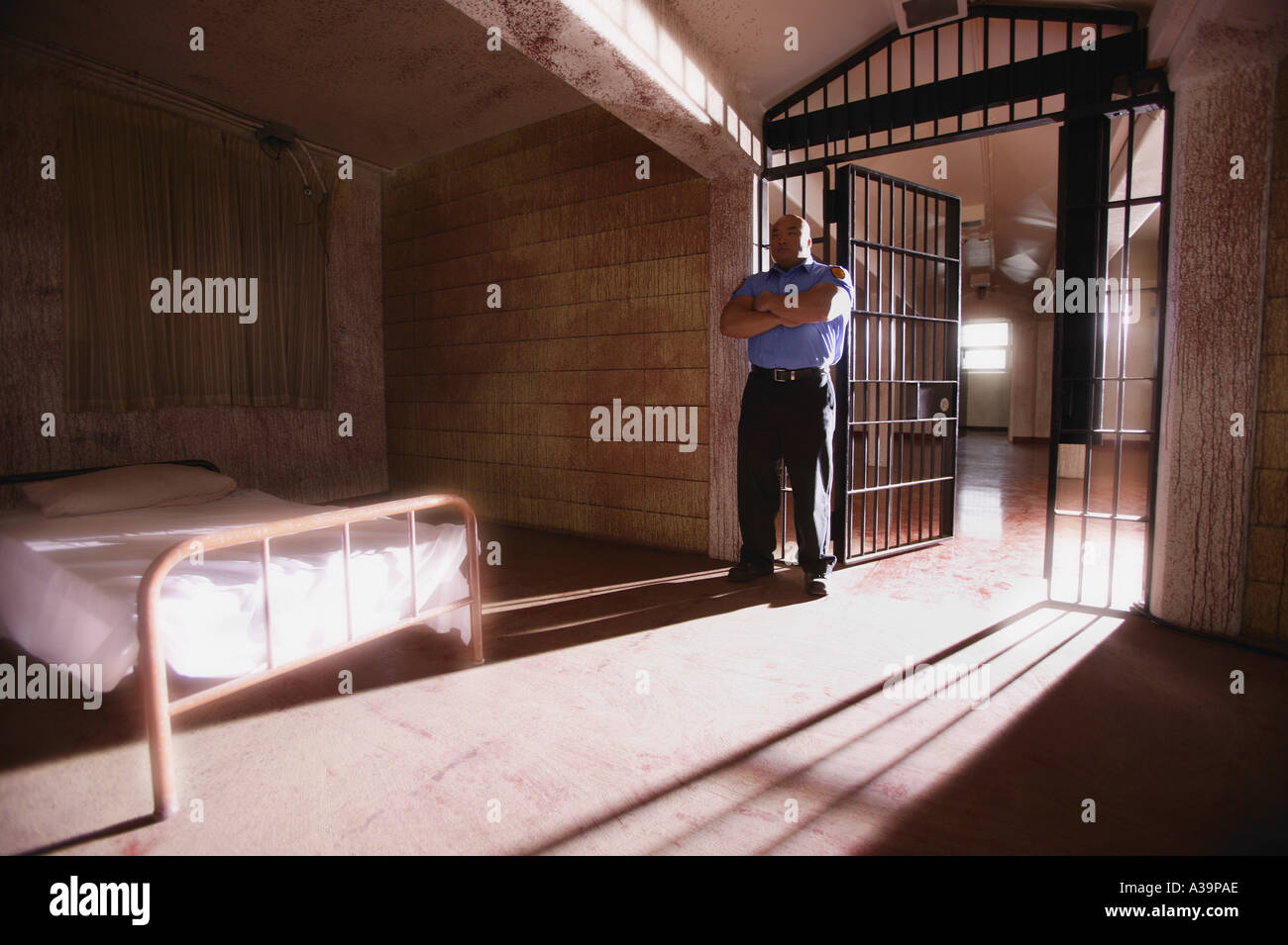 Prison security guard and cell Stock Photo - Alamy