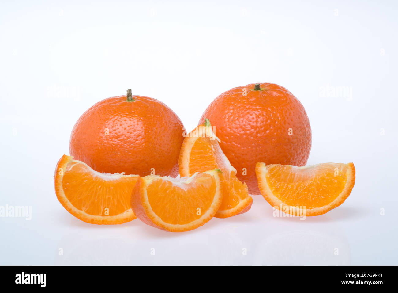 2 two oranges and segments Stock Photo - Alamy