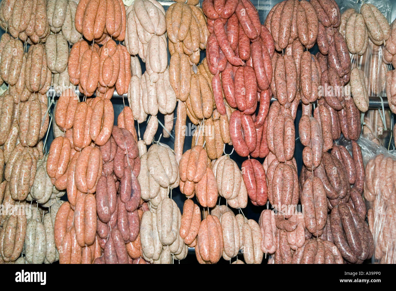 Selection of British hand-made Sausages hanging display Stock Photo - Alamy