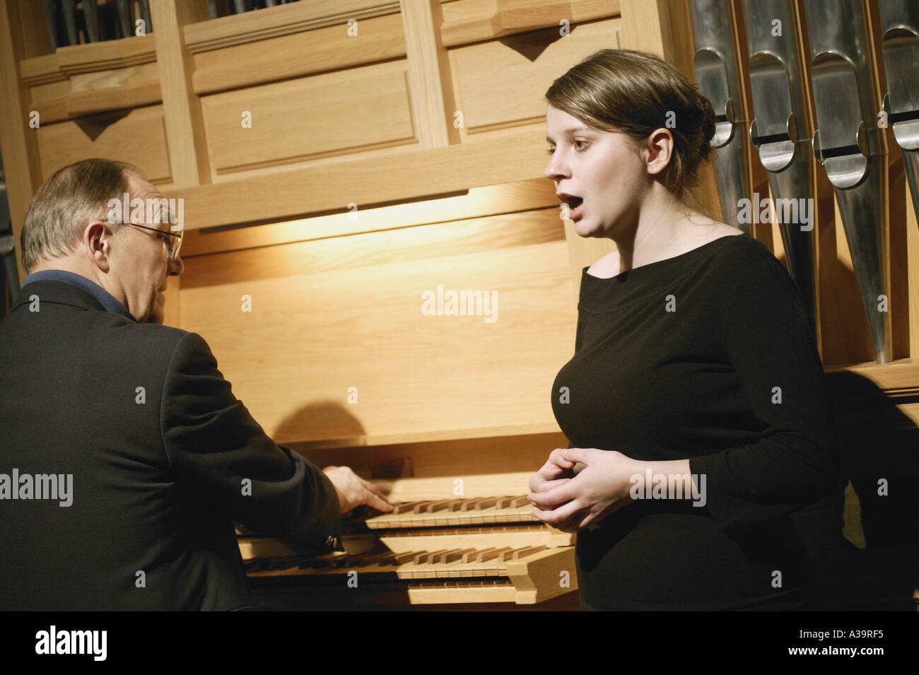 Woman organist hi-res stock photography and images - Alamy