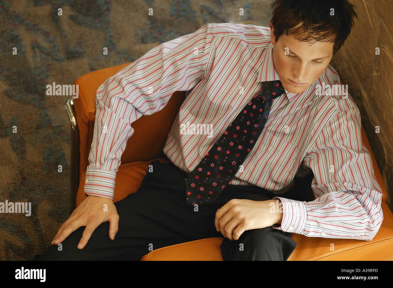 Man young shirt necktie chair hi-res stock photography and images - Alamy