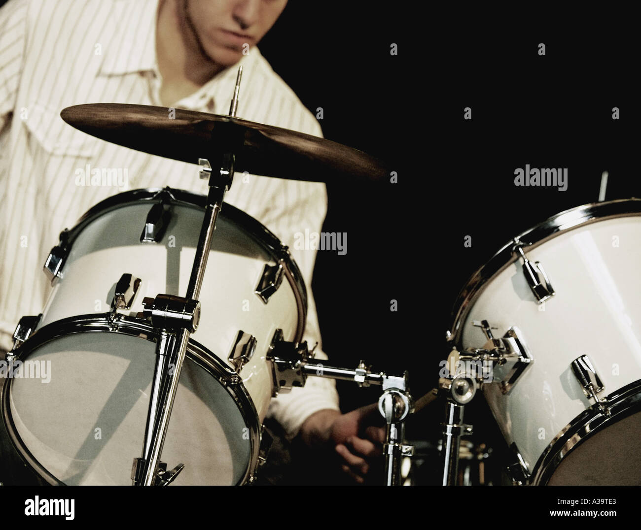 Drum kit being played Stock Photo - Alamy