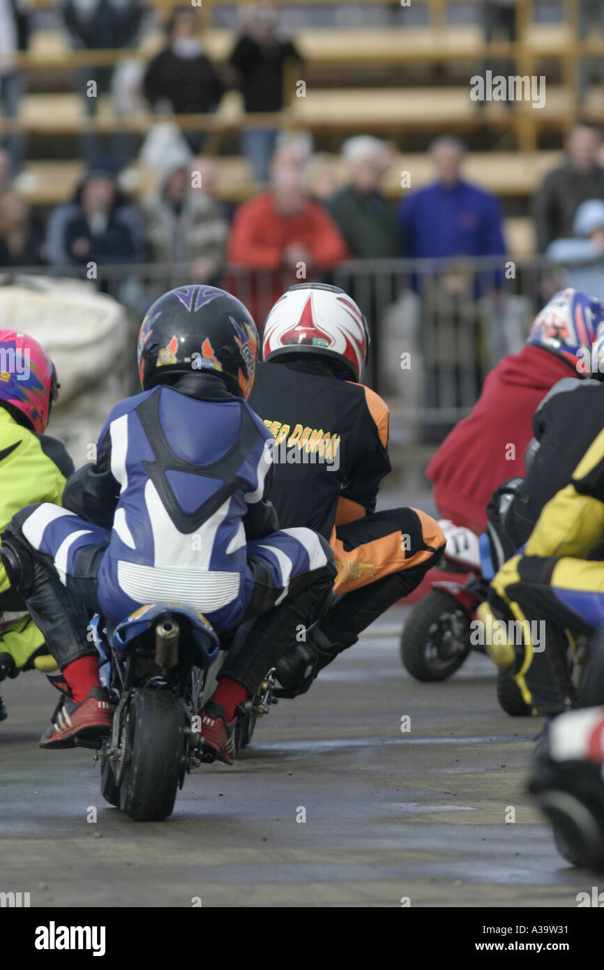Junior minibike take a corner behind angle at demonstration Motorcycle ...