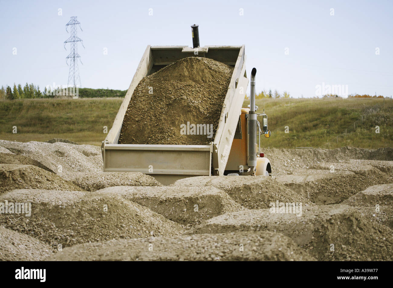 Dumper truck discarding load Stock Photo - Alamy