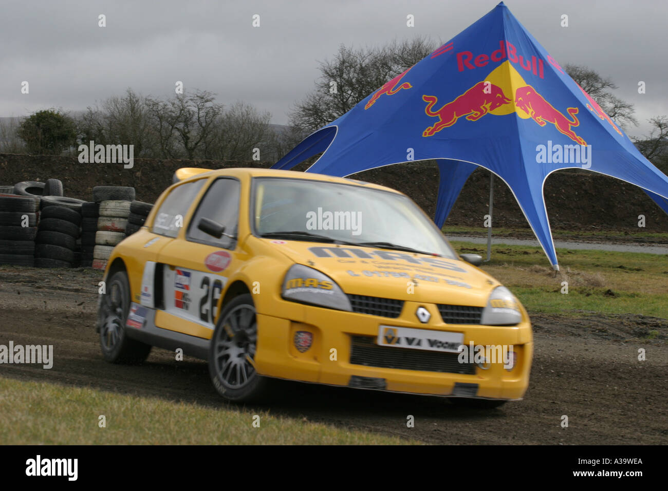 Renault Clio rallycross car slides past the Red Bull tent British ...