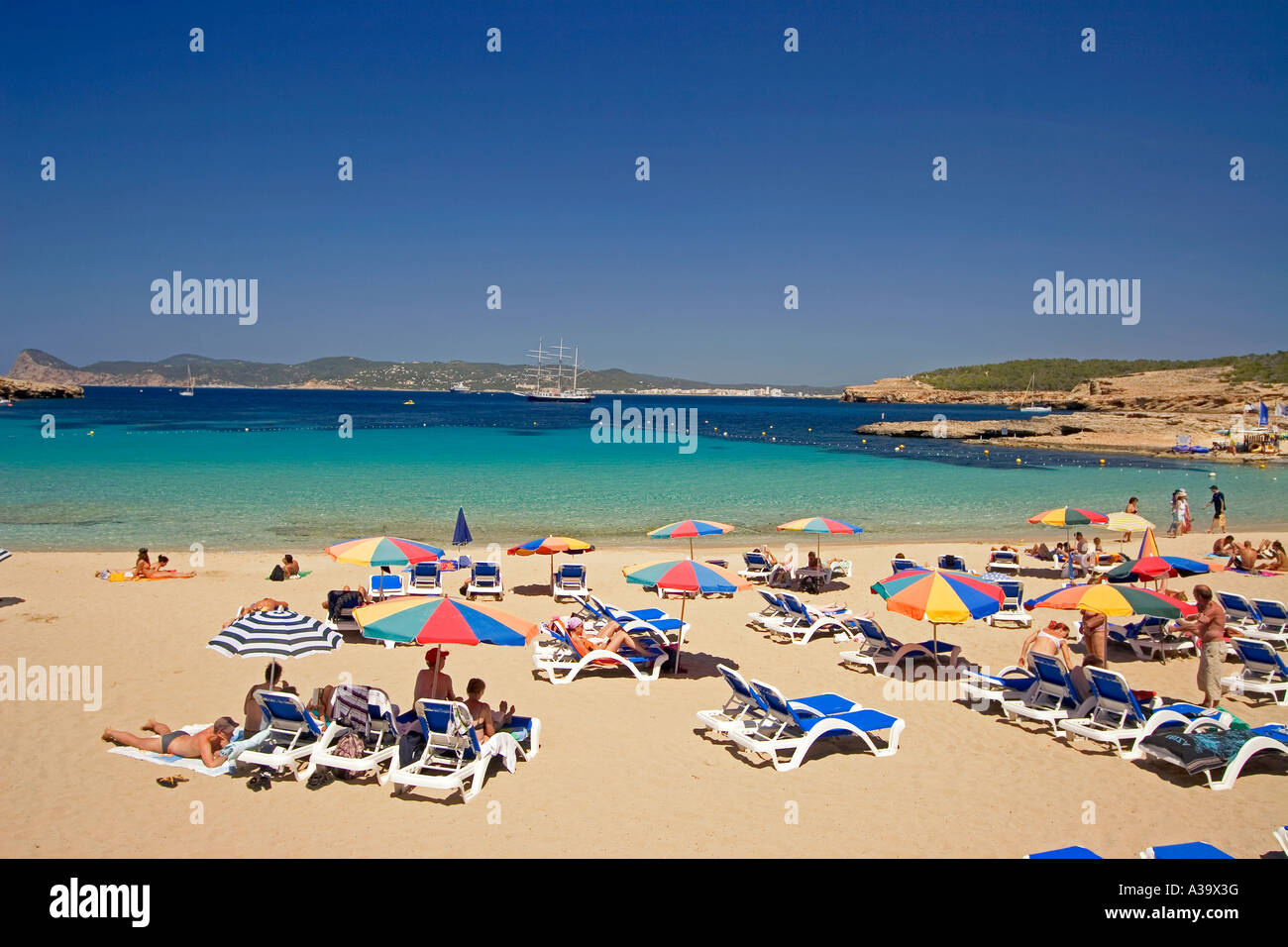 Ibiza beach Cala Bassa beach west coast people Stock Photo - Alamy