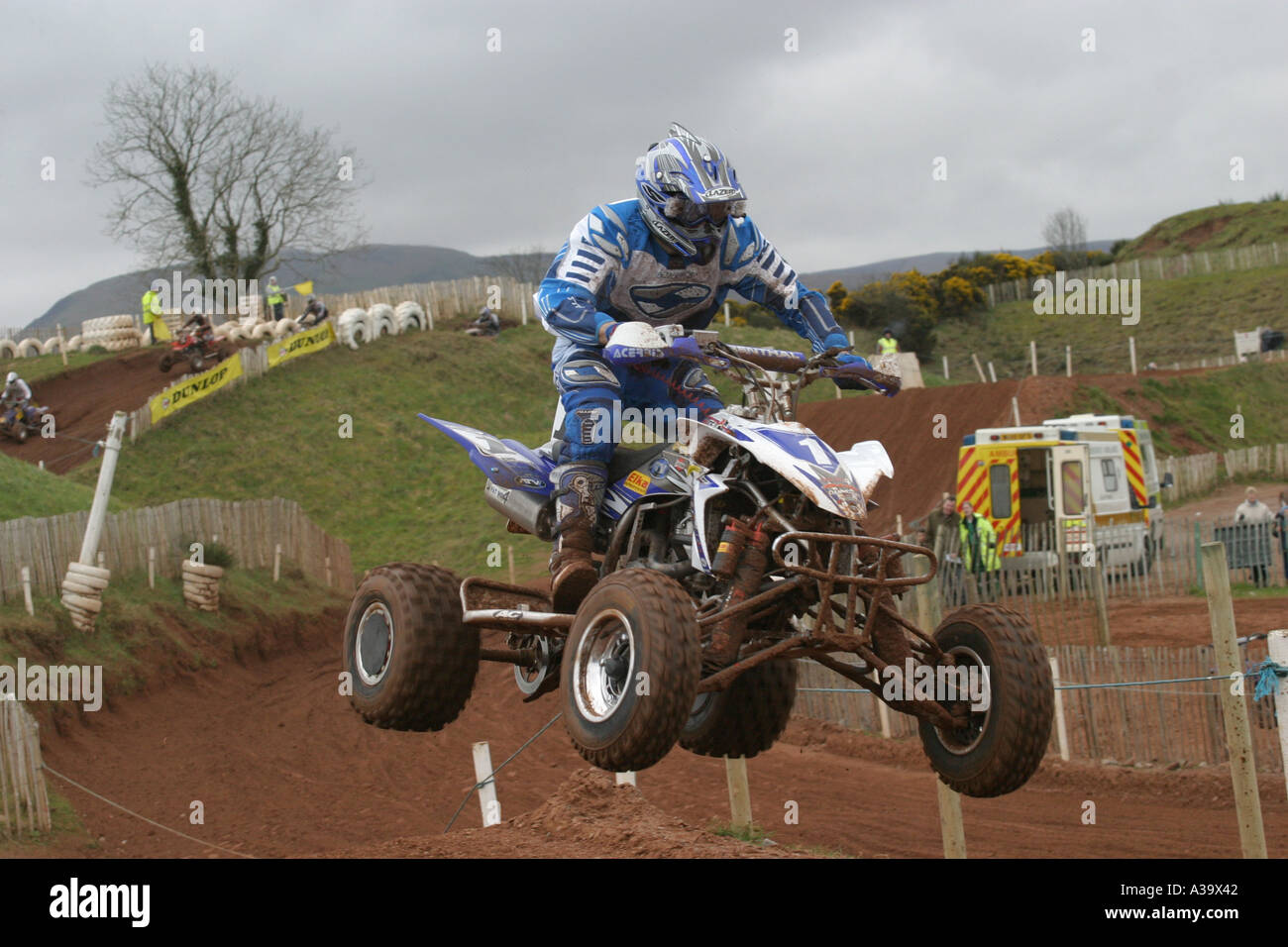 blue Quad racer jumps high during british championship quad racing at ...