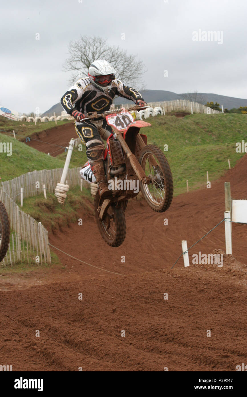 motocross rider jumps high while racing at Desertmartin Northern ...