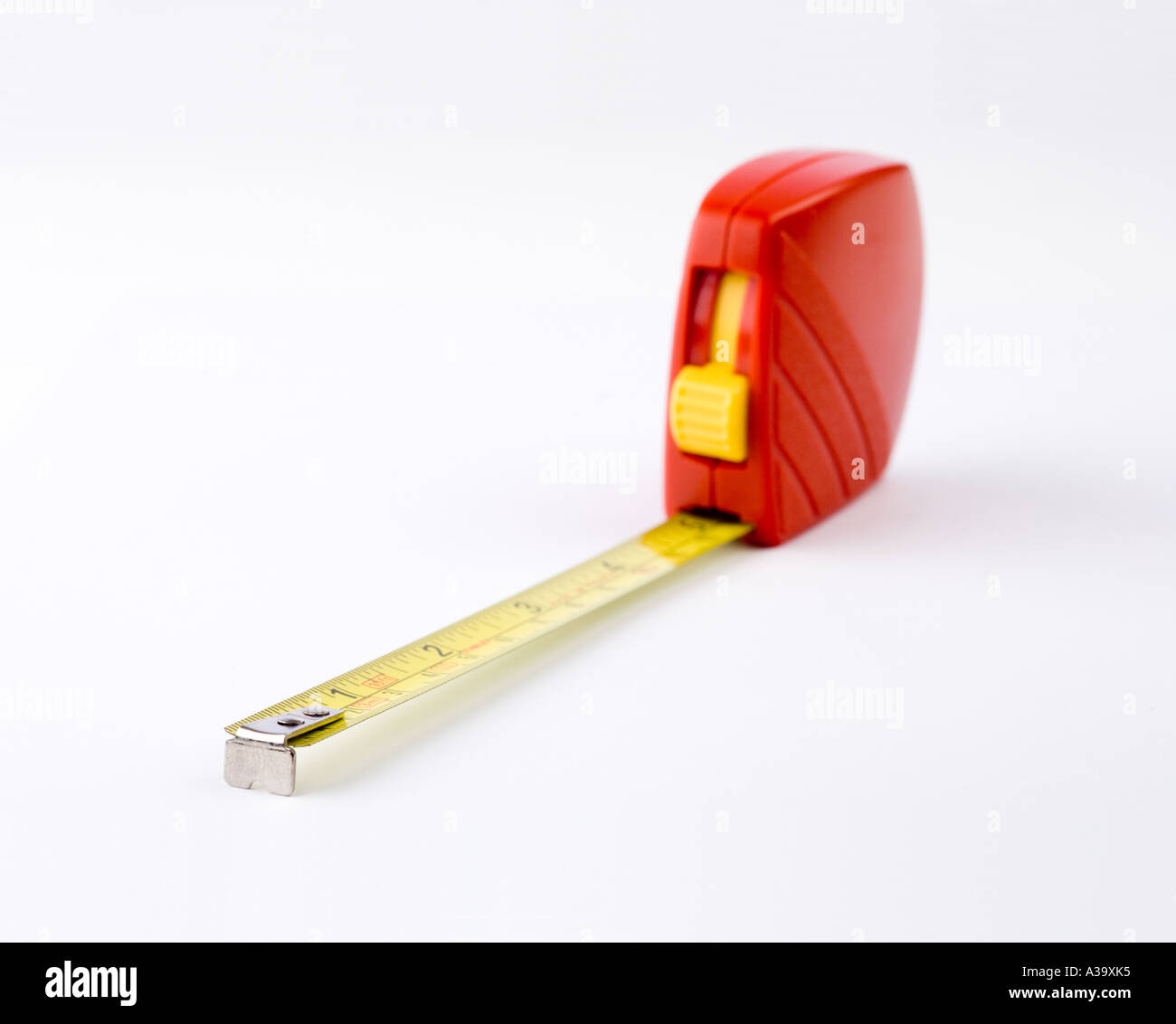 Yellow extended tape measure Cut Out Stock Images & Pictures - Alamy