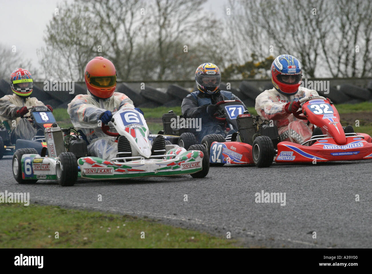 rolling grid of rotax max kart race at a wet Nutts Corner Motorsport ...