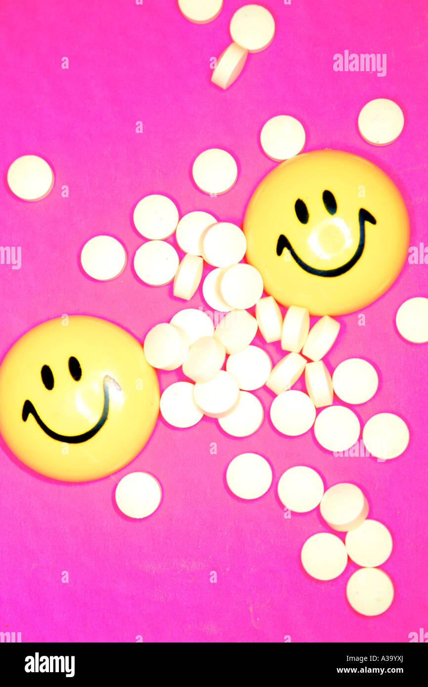 Happy faces and pills Stock Photo - Alamy