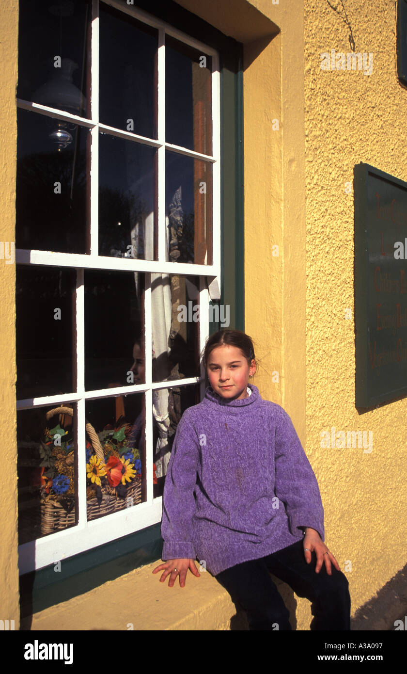 Child Sat on Window Sill Stock Photo - Alamy