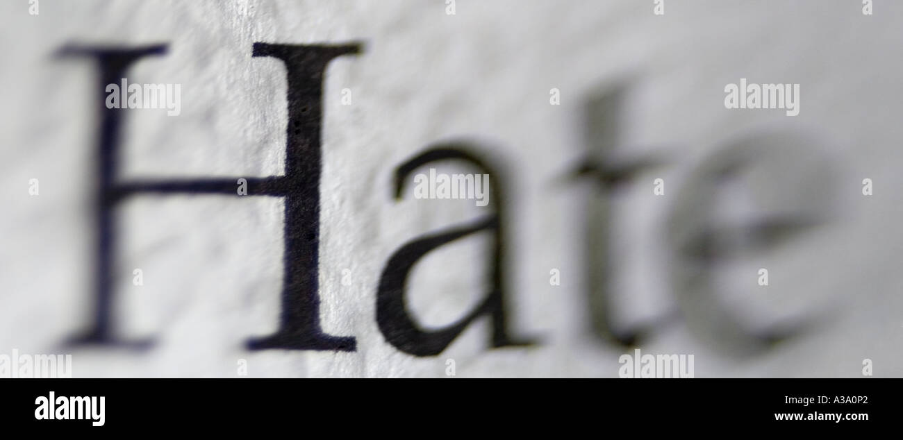 the word hate printed on to texture paper Stock Photo - Alamy