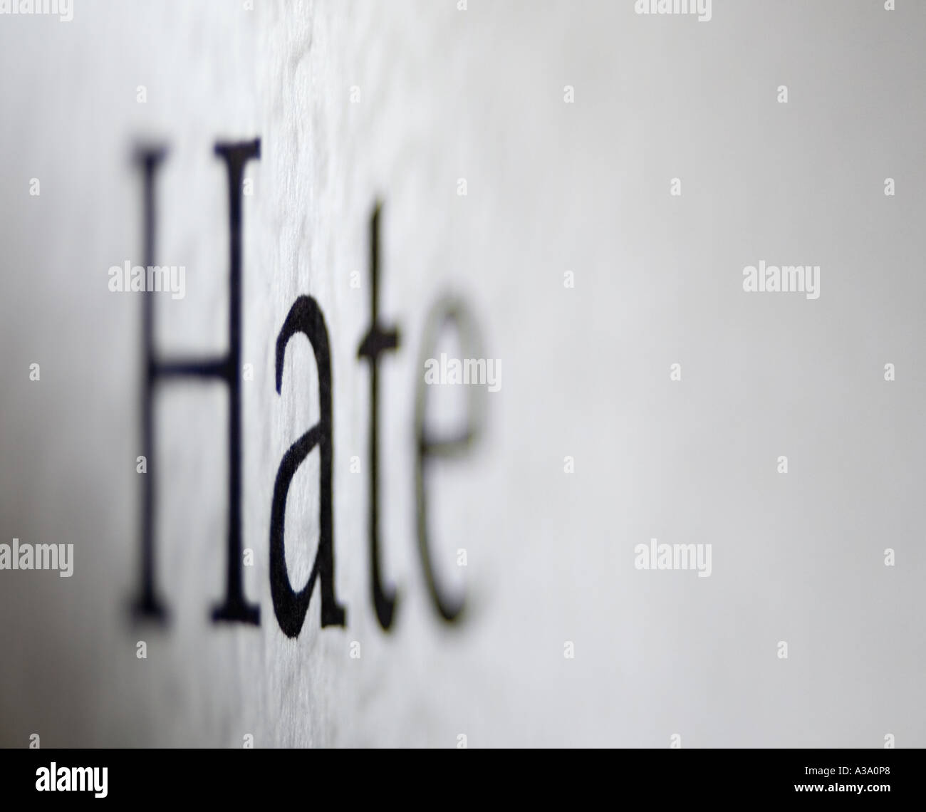 the word hate printed on to texture paper Stock Photo - Alamy