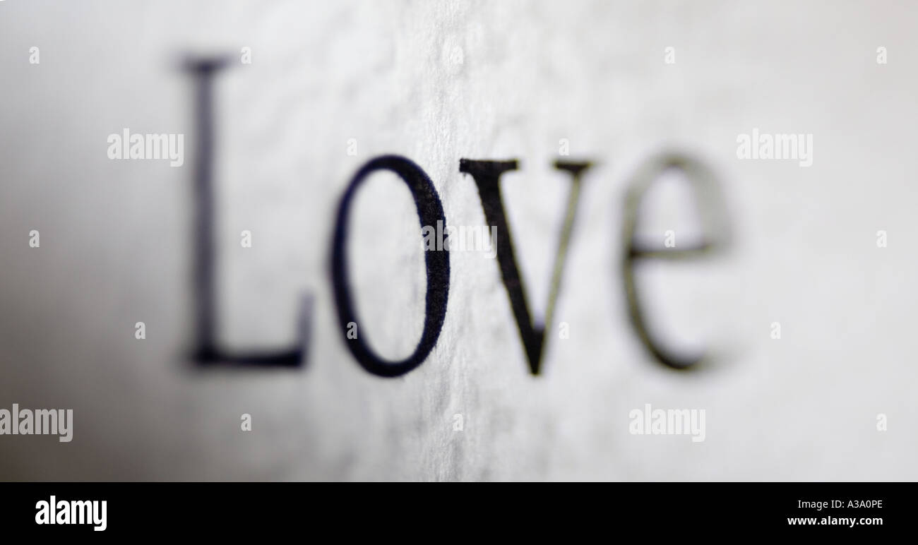 the word love printed on to texture paper Stock Photo - Alamy