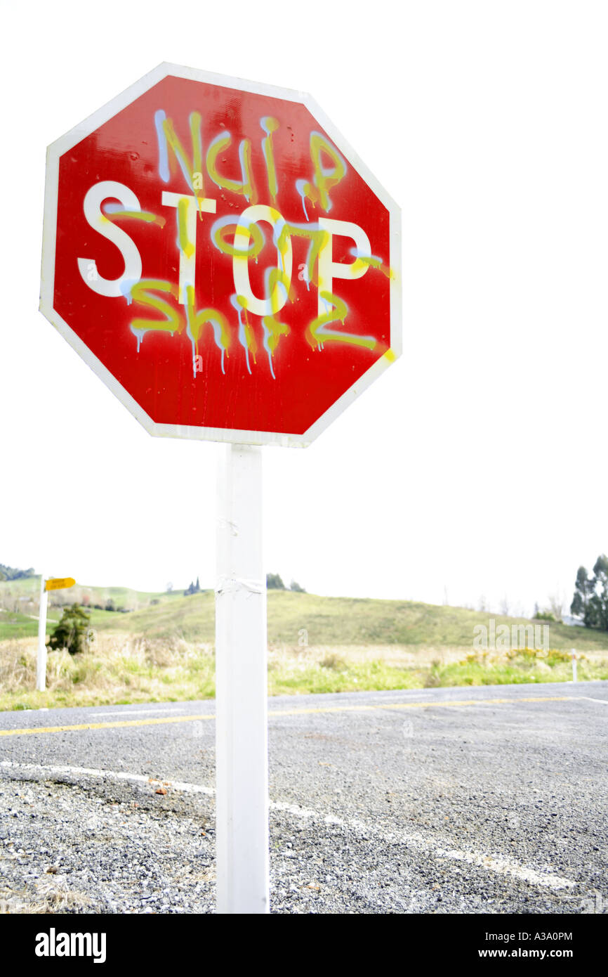 Grafitti sign on stop sign Stock Photo - Alamy