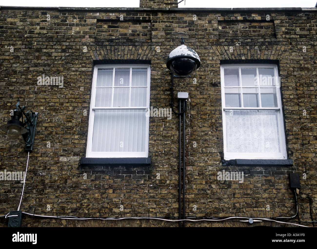 March 15th 2002 A CCTV camera contrats with old style architecture on a ...