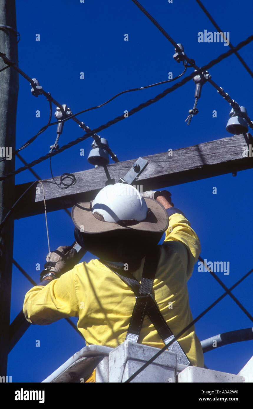 Electricity Worker working on Powerlines, Australia Stock Photo - Alamy