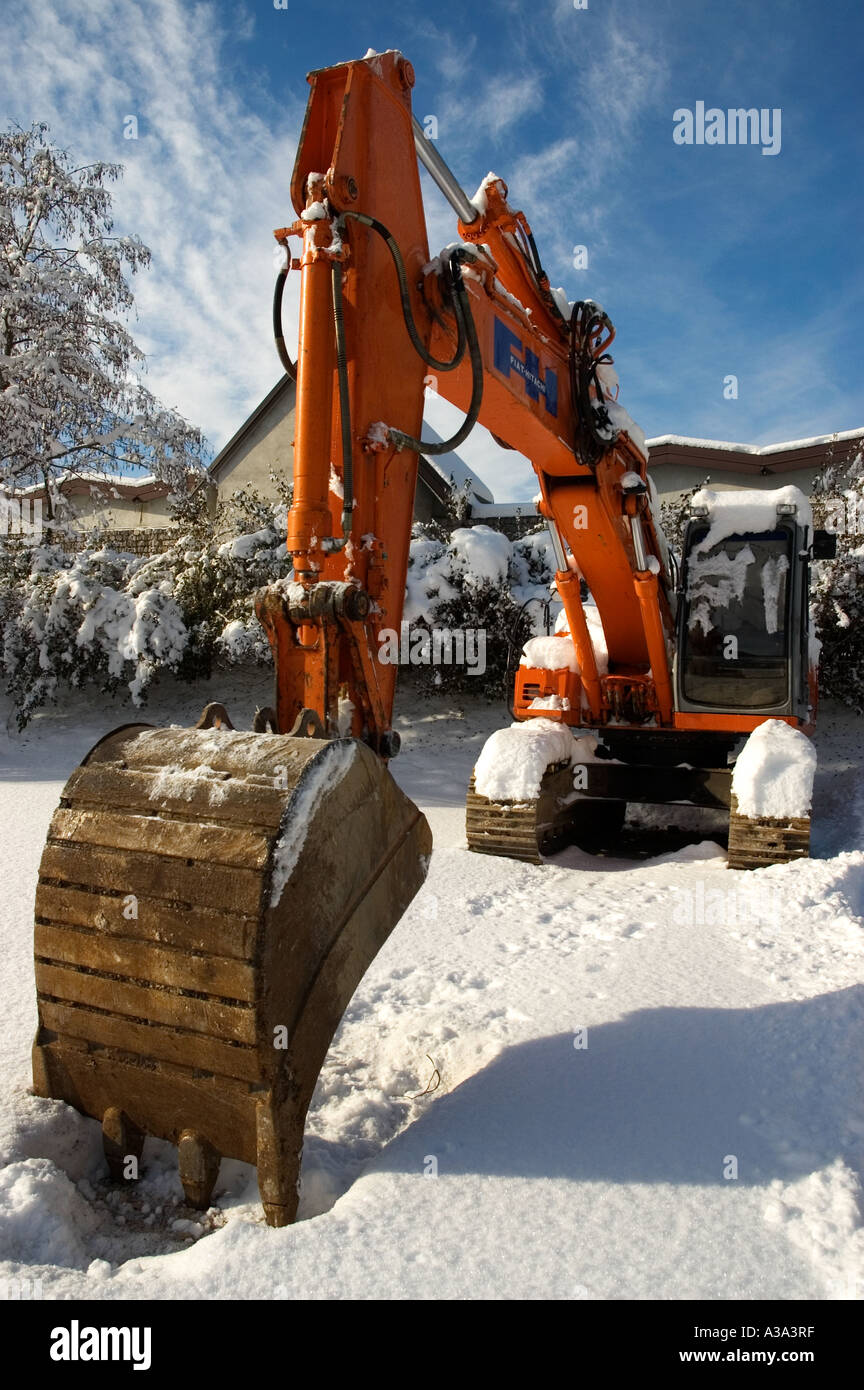 bulldozer parked in the snow - region of friuli venezia giulia ...