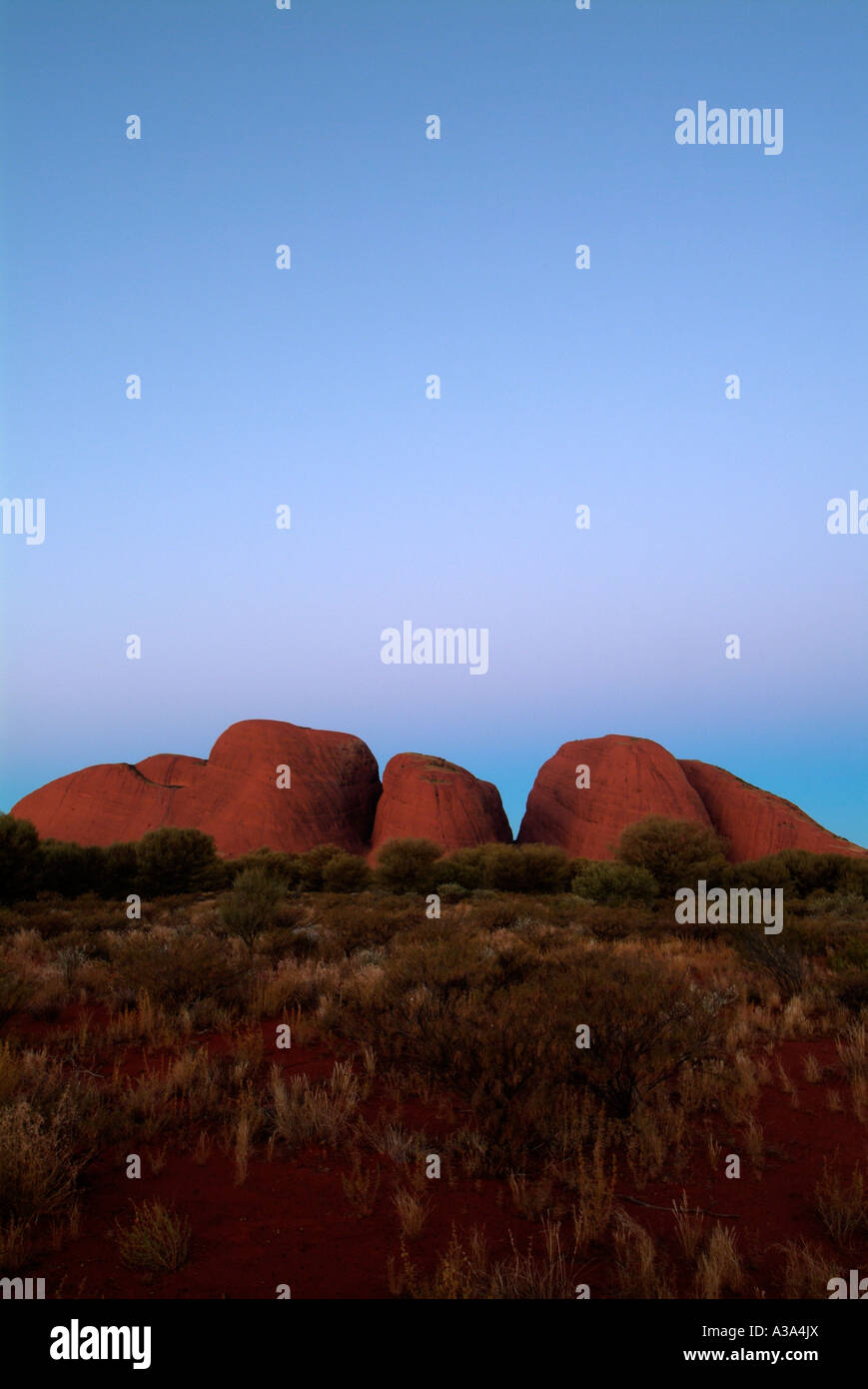 Round domes known as Kata Tjuta or The Olgas at dusk in Uluru Kata ...