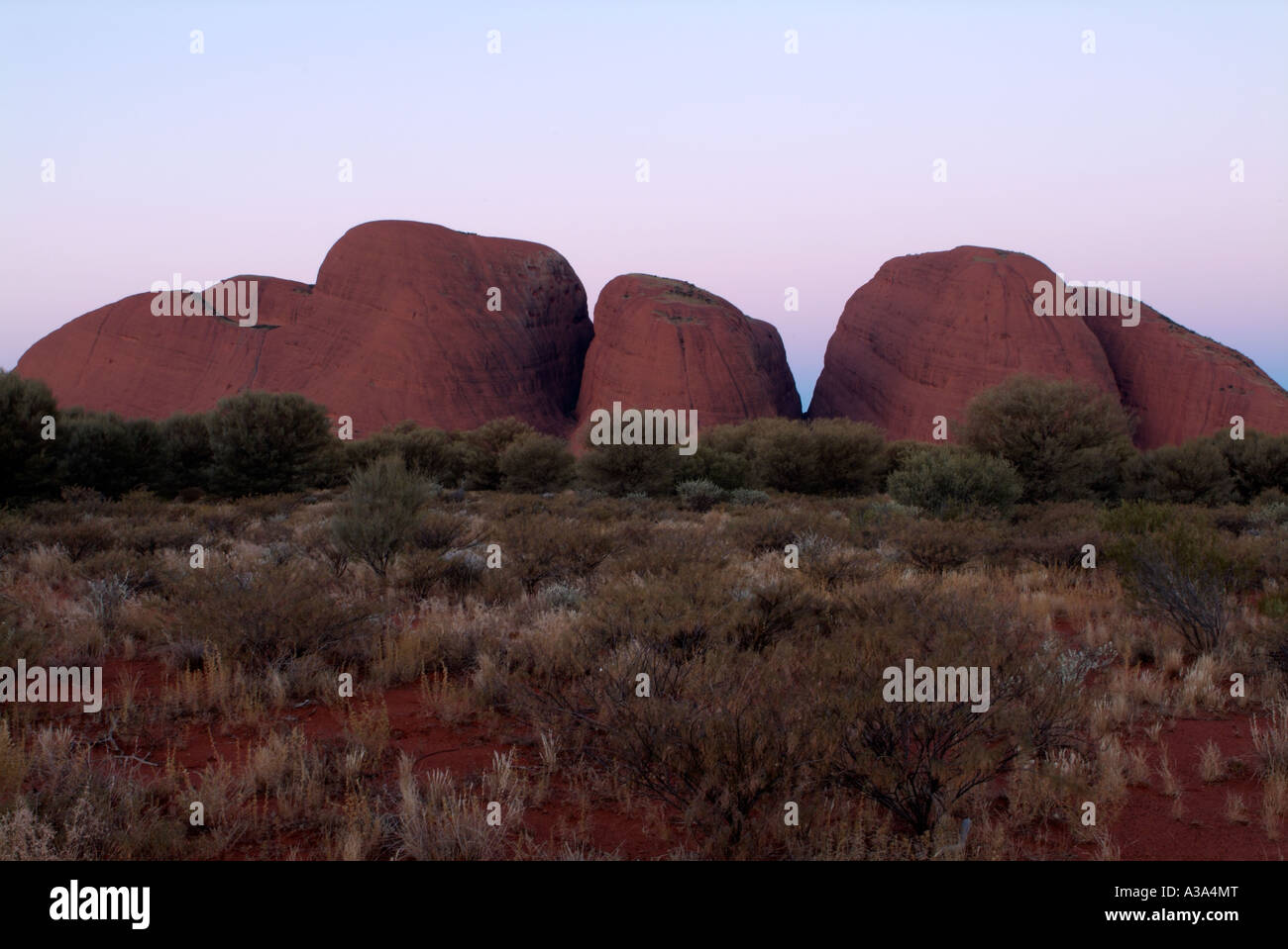 Round domes known as Kata Tjuta or The Olgas at dusk in Uluru Kata ...