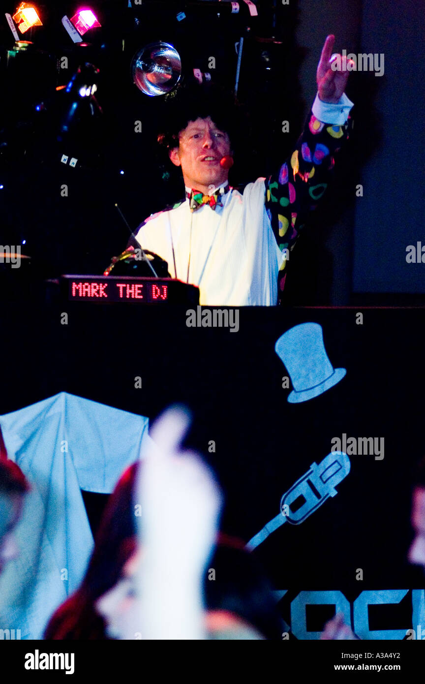 DJ with arm in air Stock Photo - Alamy