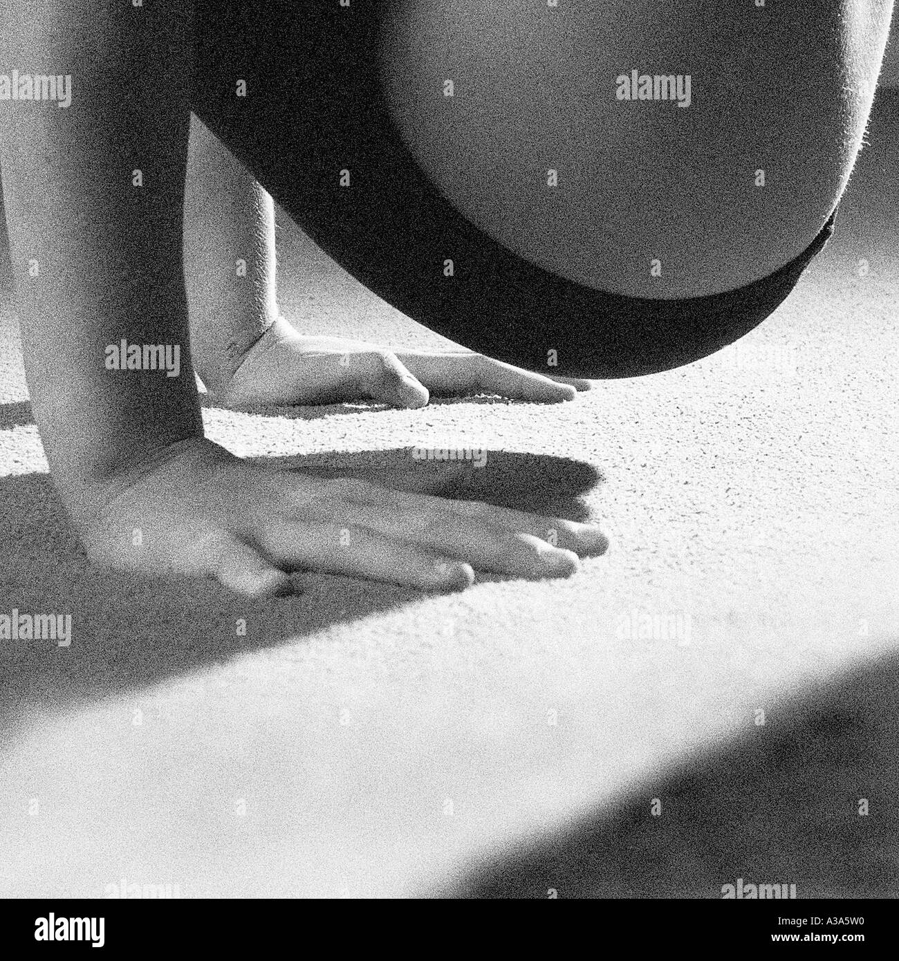 female gymnast balancing on hands on floor close-up Stock Photo - Alamy