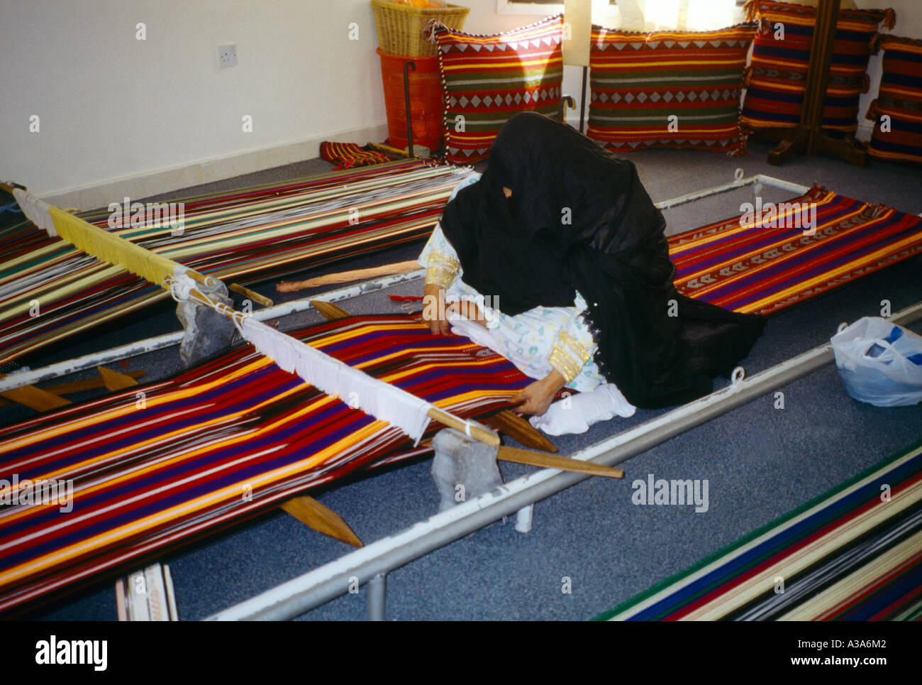 Abu Dhabi UAE Veiled Woman Weaving At Abu Dhabi Craft Centre Stock ...