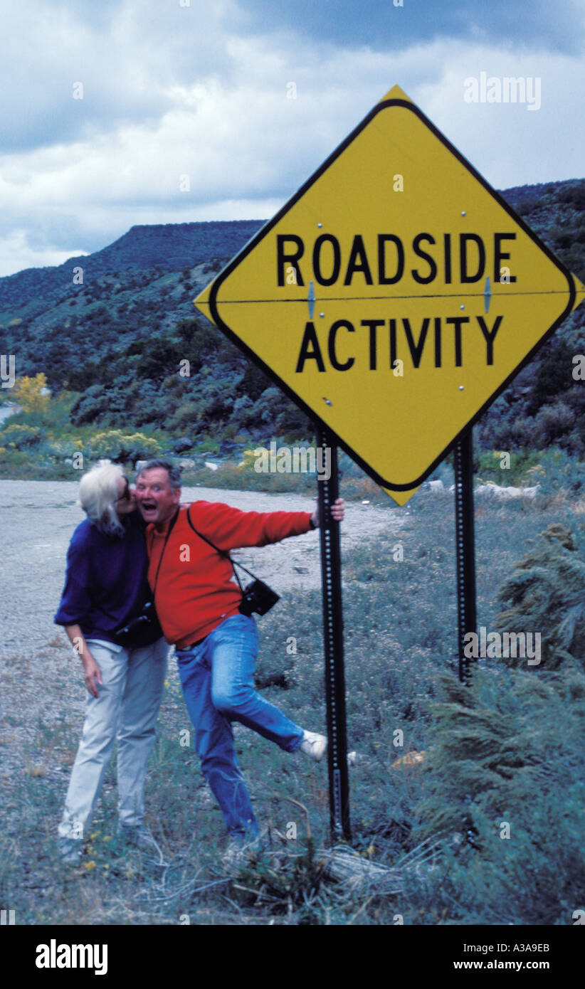 Carl Purcell engages in roadside activity with unidentified woman Stock ...